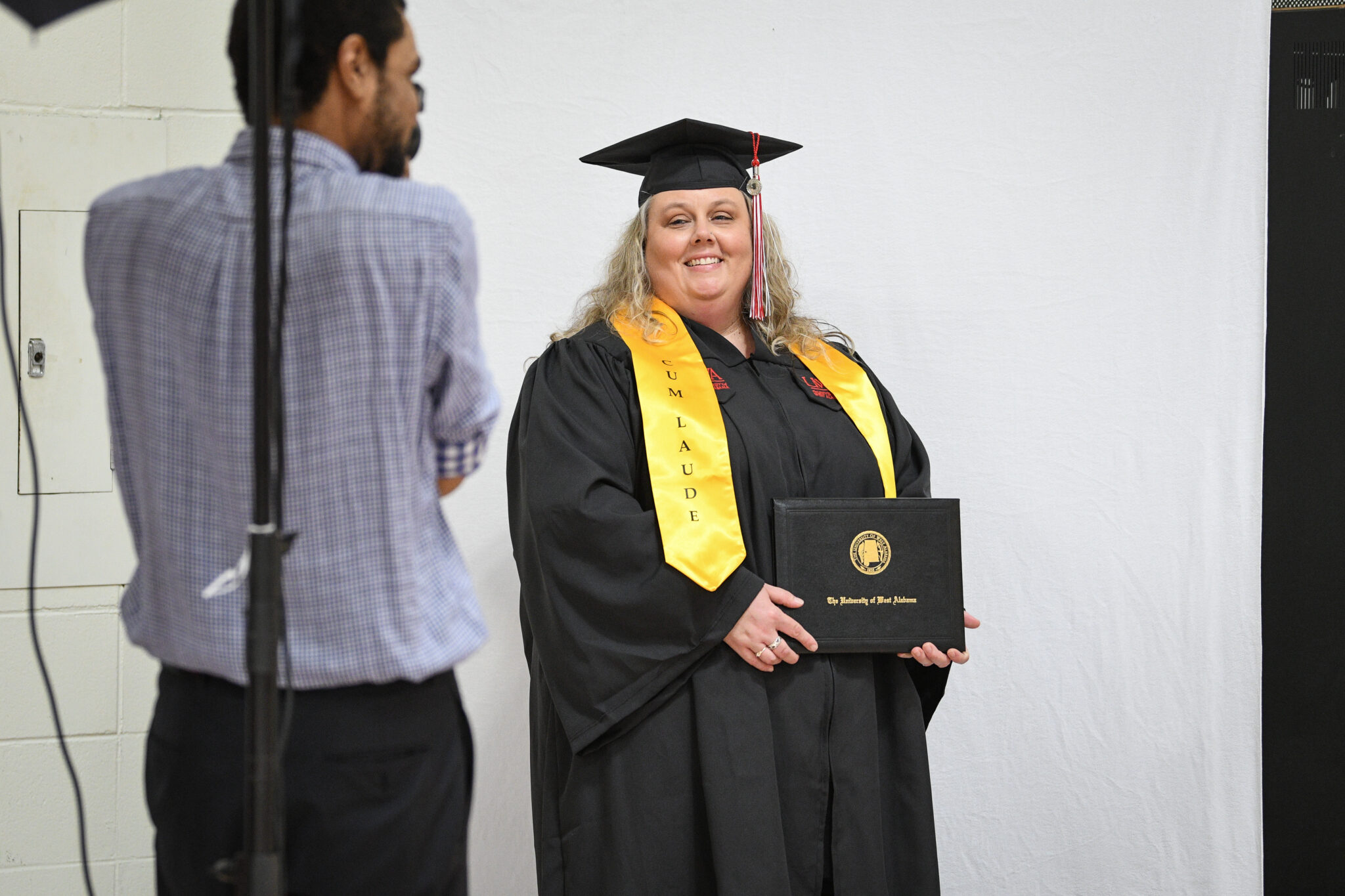 Mother and son celebrate together at UWA's fall commencement | UWA