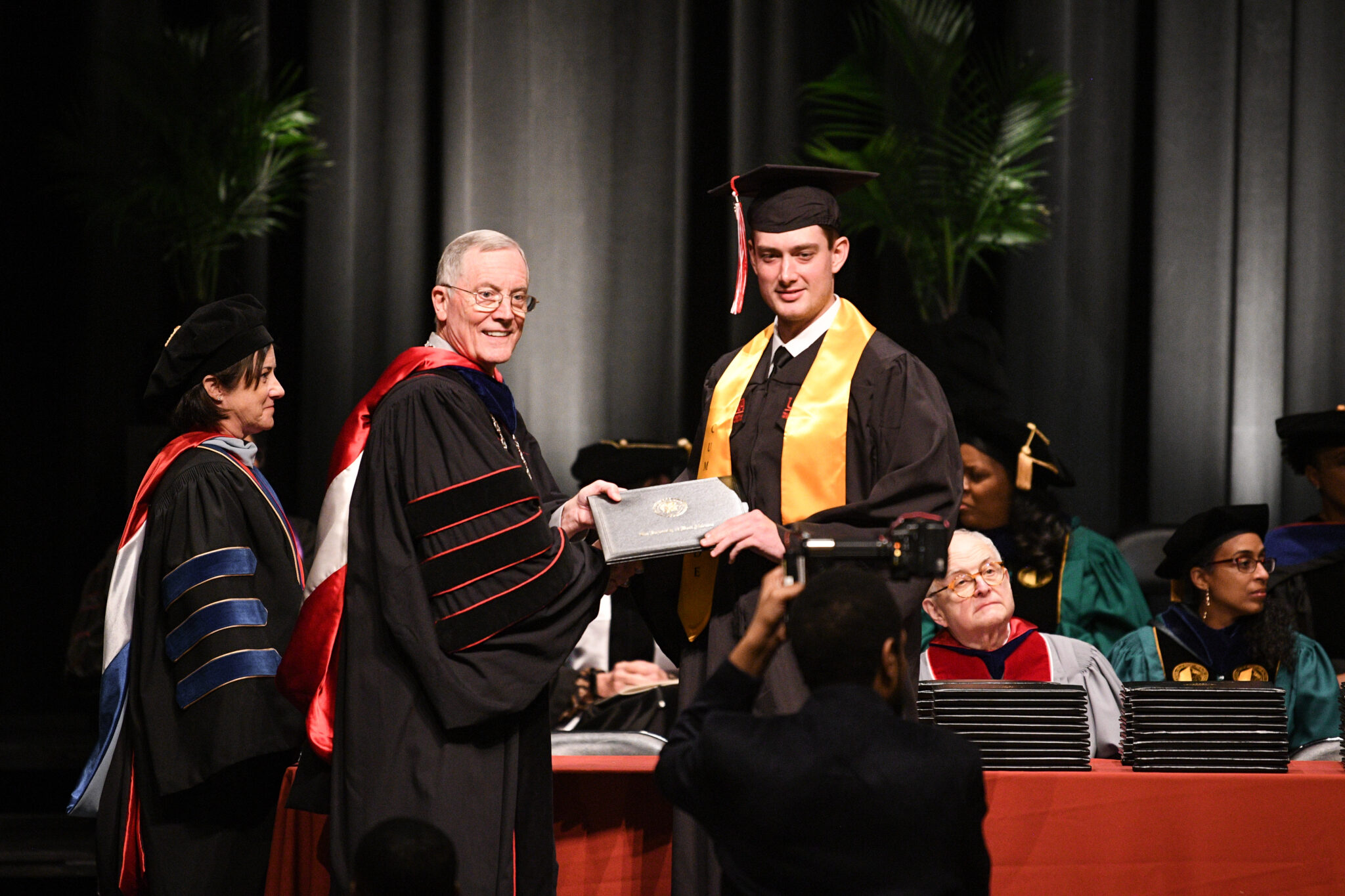 Mother and son celebrate together at UWA's fall commencement | UWA